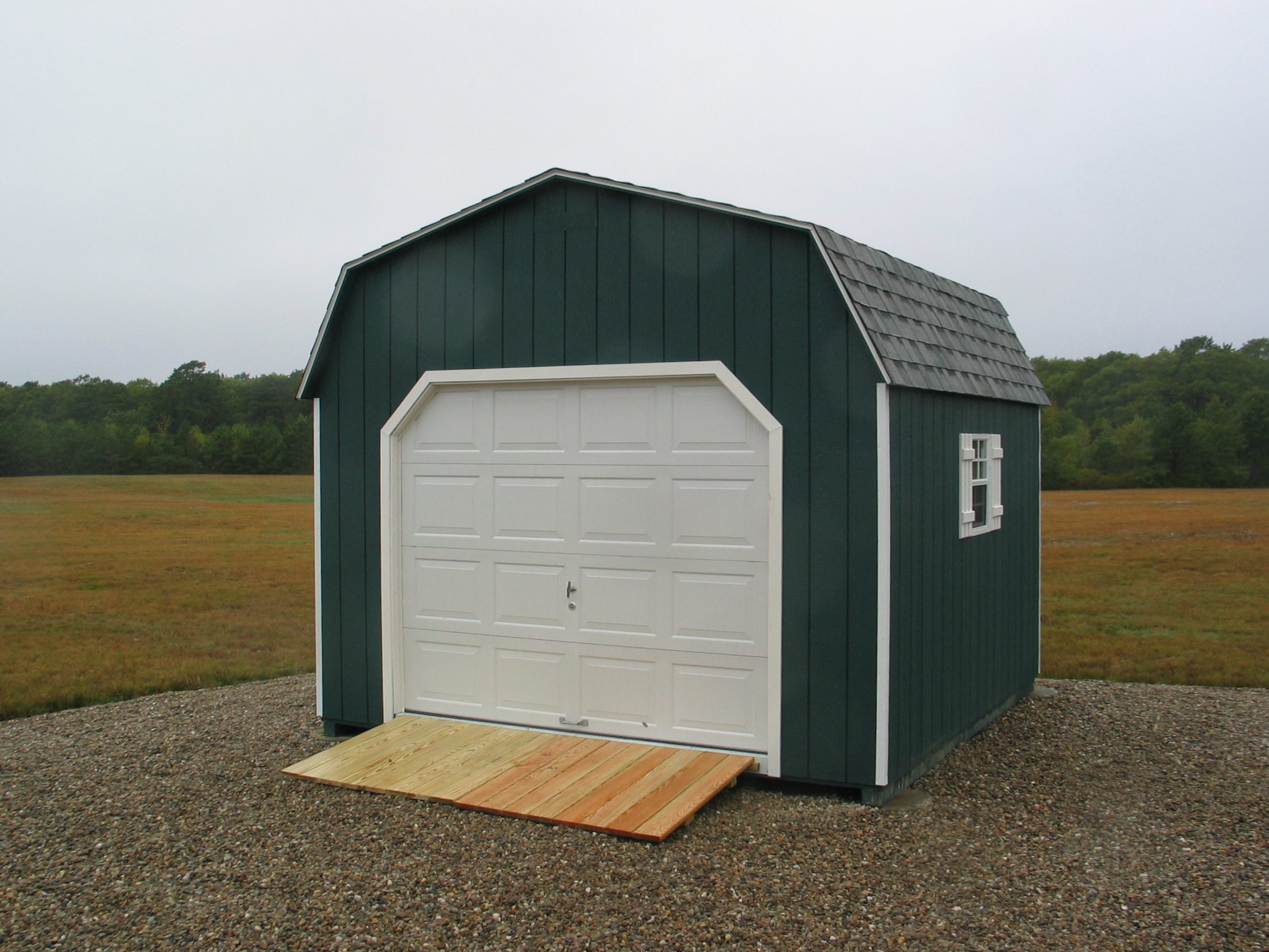 12x12 Backyard Dutch Barn with overhead door | The Shed Place
